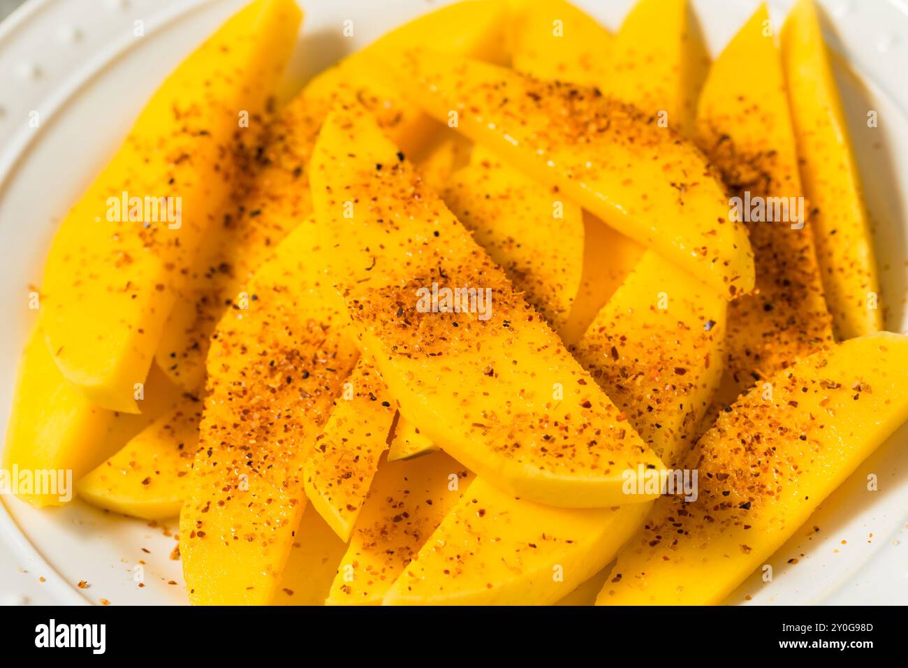 Healthy Mexican Sliced Mango with Tajin Spice and Chili Stock Photo - Alamy