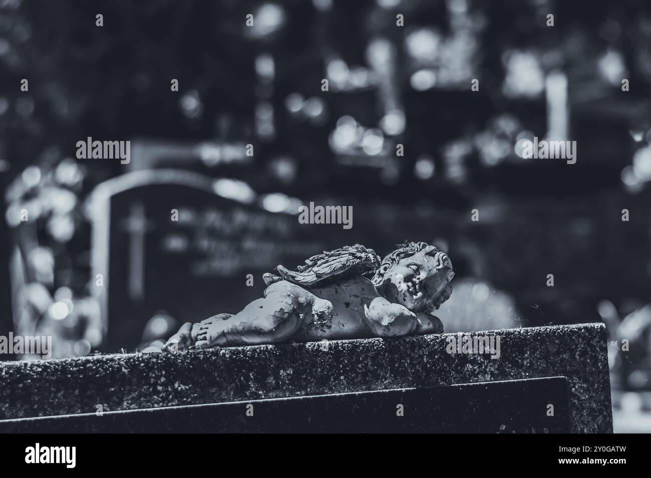 sleeping angel status, All saints day Stock Photo - Alamy