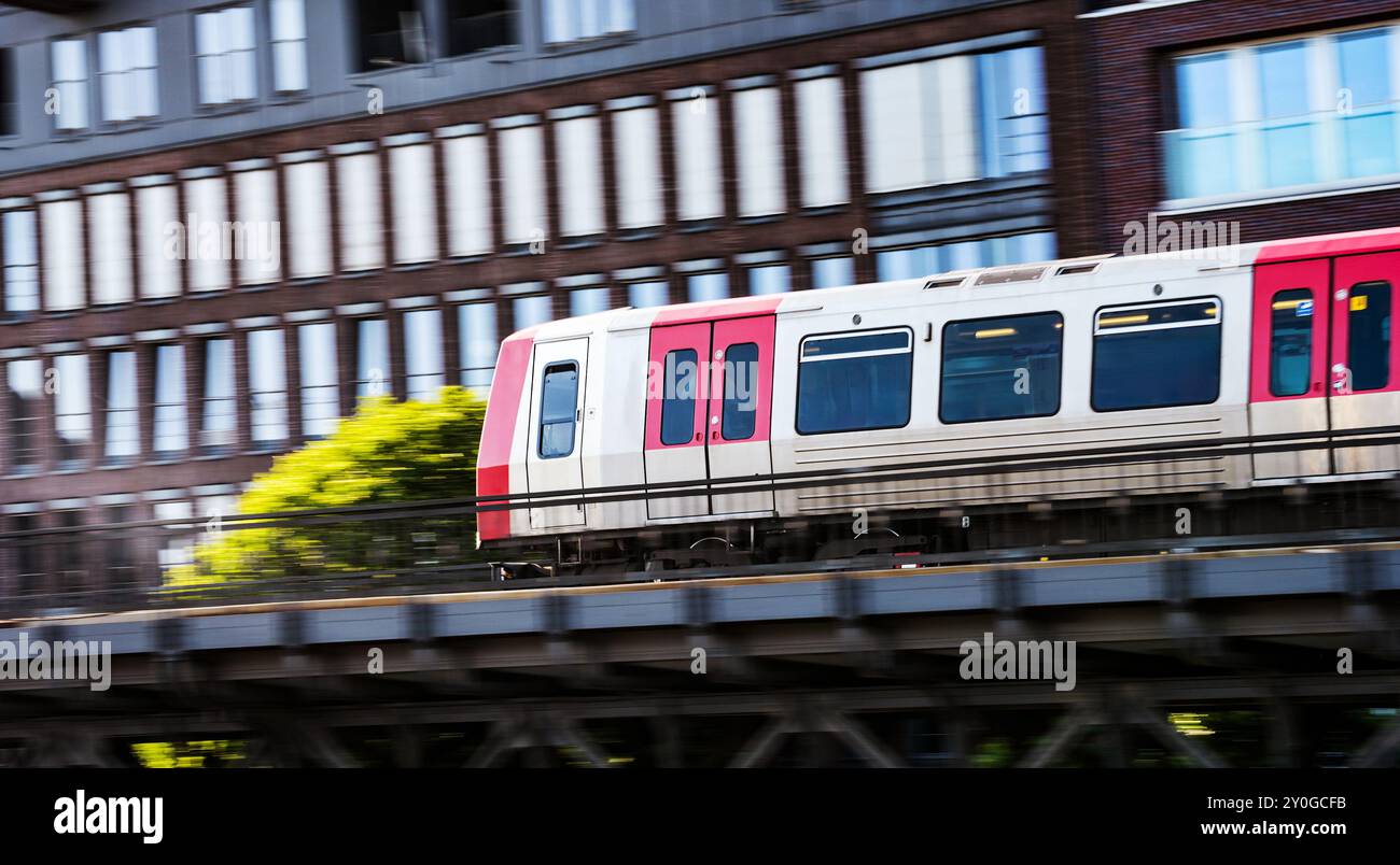 Quickly Moving Subway Train On Raised Track In Hamburg Stock Photo - Alamy