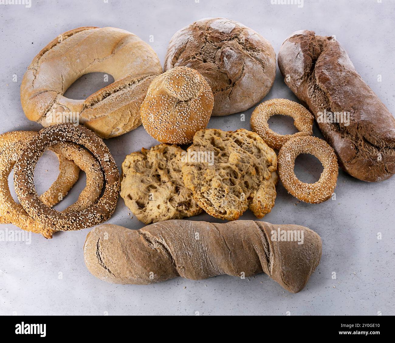Selection of Greek breads laid out flat and photographed from overhead ...
