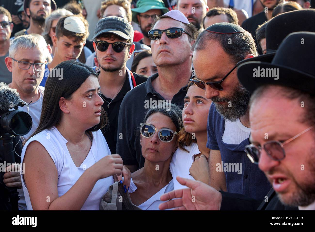 Jonathan Polin, second right, and Rachel Goldberg, 4th right, parents ...
