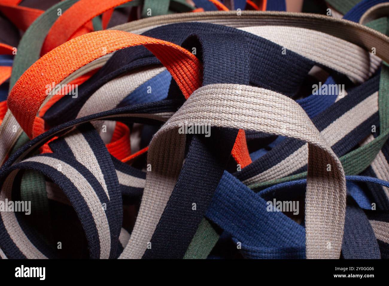Colorful Woven Fabric Straps in a Tangled Pile Stock Photo - Alamy