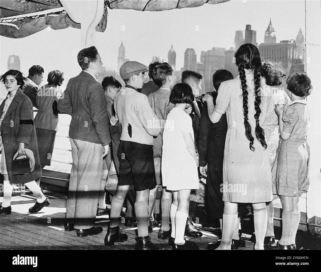 Jewish refugee children are shown on the deck of the SS President ...