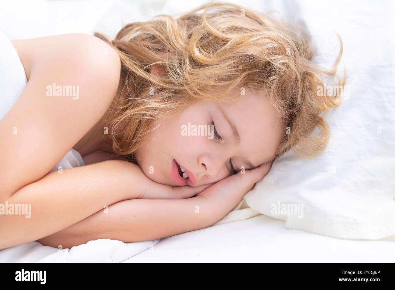 Kid sleeps face close up. Kid sleeping in bed. Child sleeping under ...