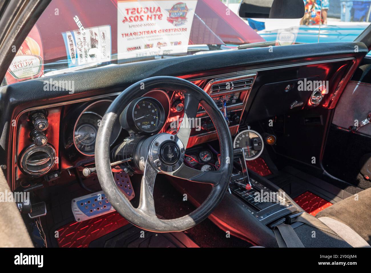 A classic car cockpit offers a nostalgic journey with its vintage dials ...