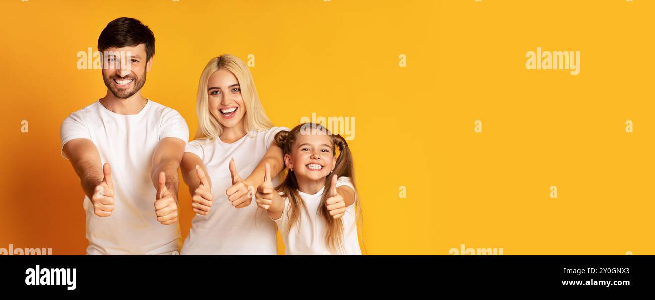 Happy Family Celebrating Together With Big Smiles and Thumbs Up Stock ...
