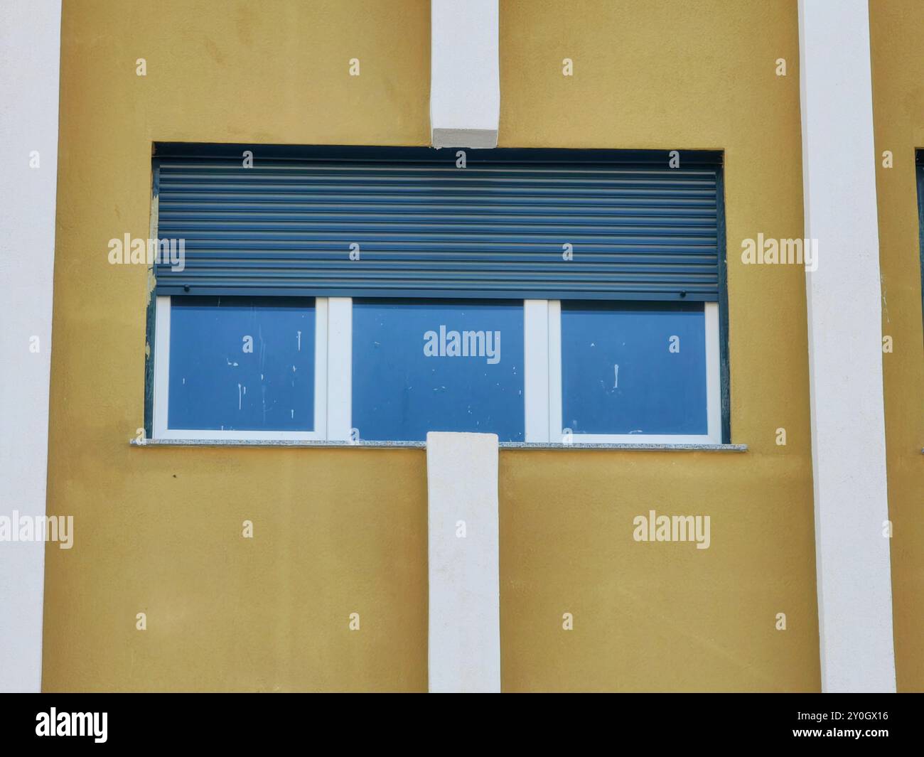 Window Glass Frames of New Building Under Development: Beige Wall ...