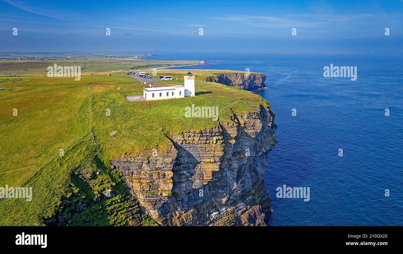Duncansby Head Lighthouse in late summer the rocky cliffs of the most ...