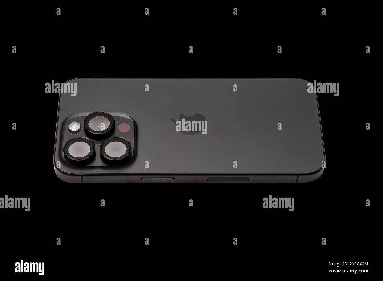 Black iPhone 15 Pro Titanium, on a black background, with aftermarket ...