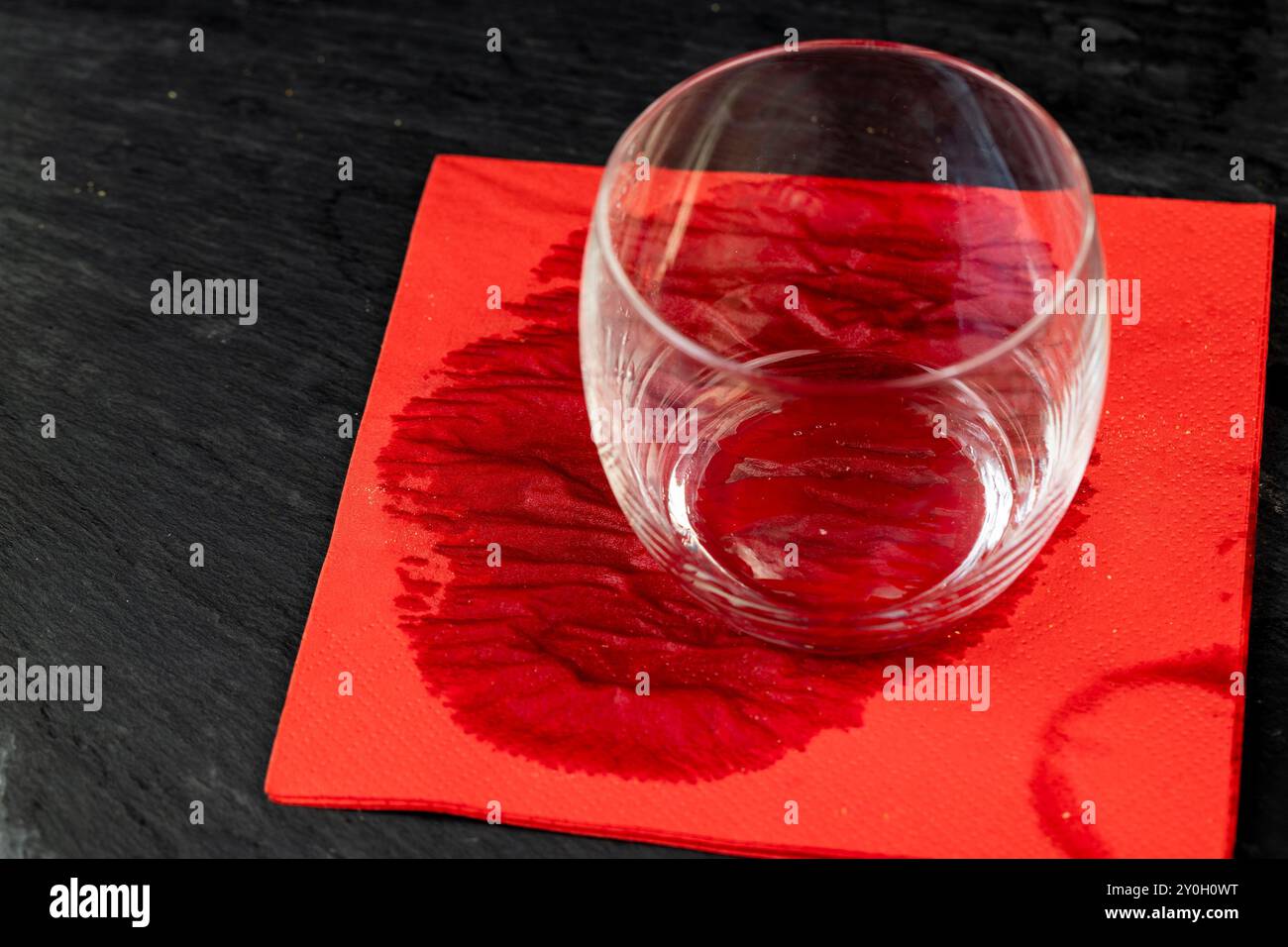 Transparent water glass and wet objects next to the glass, several ...