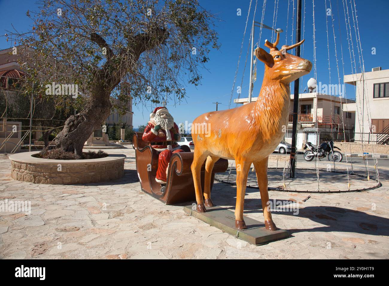 Father Christmas on his sleigh with one reindeer, Paphos, Cyprus Stock ...