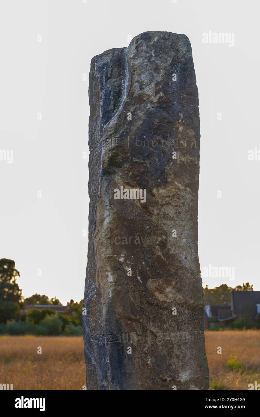 A close up photograph of a historic boundary stone marking the border ...