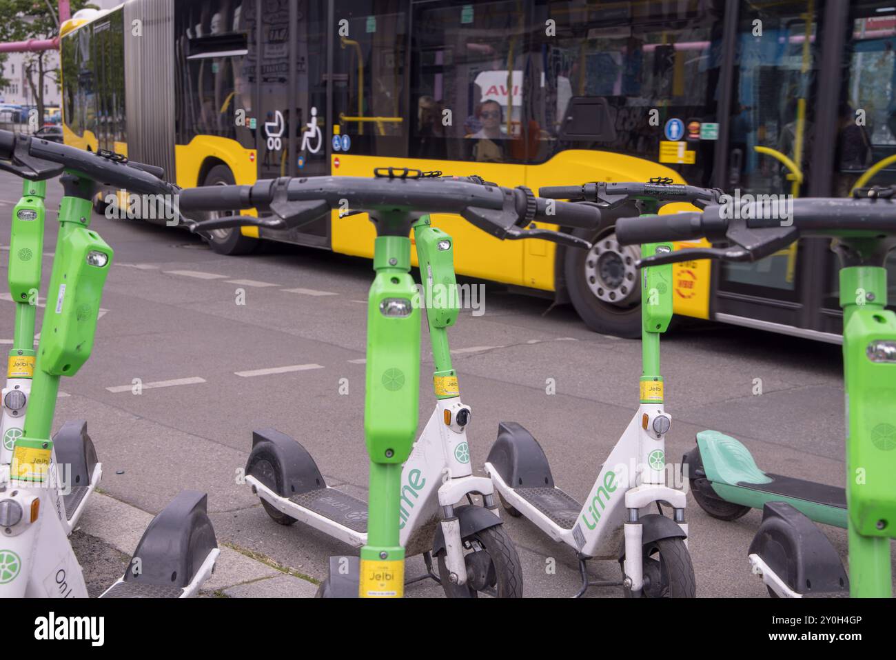 Group of Lime Electric Scooters parked on sidewalk in Berlin, Germany ...