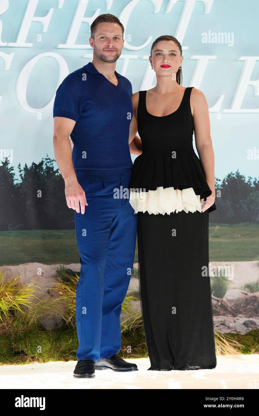 Jack Reynor, left, and Eve Hewson poses for photographers upon arrival ...