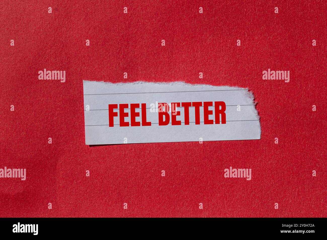 Feel better message written on ripped torn paper piece with red ...