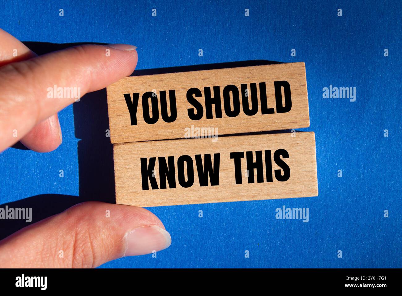 You should know this message written on wooden blocks with blue ...