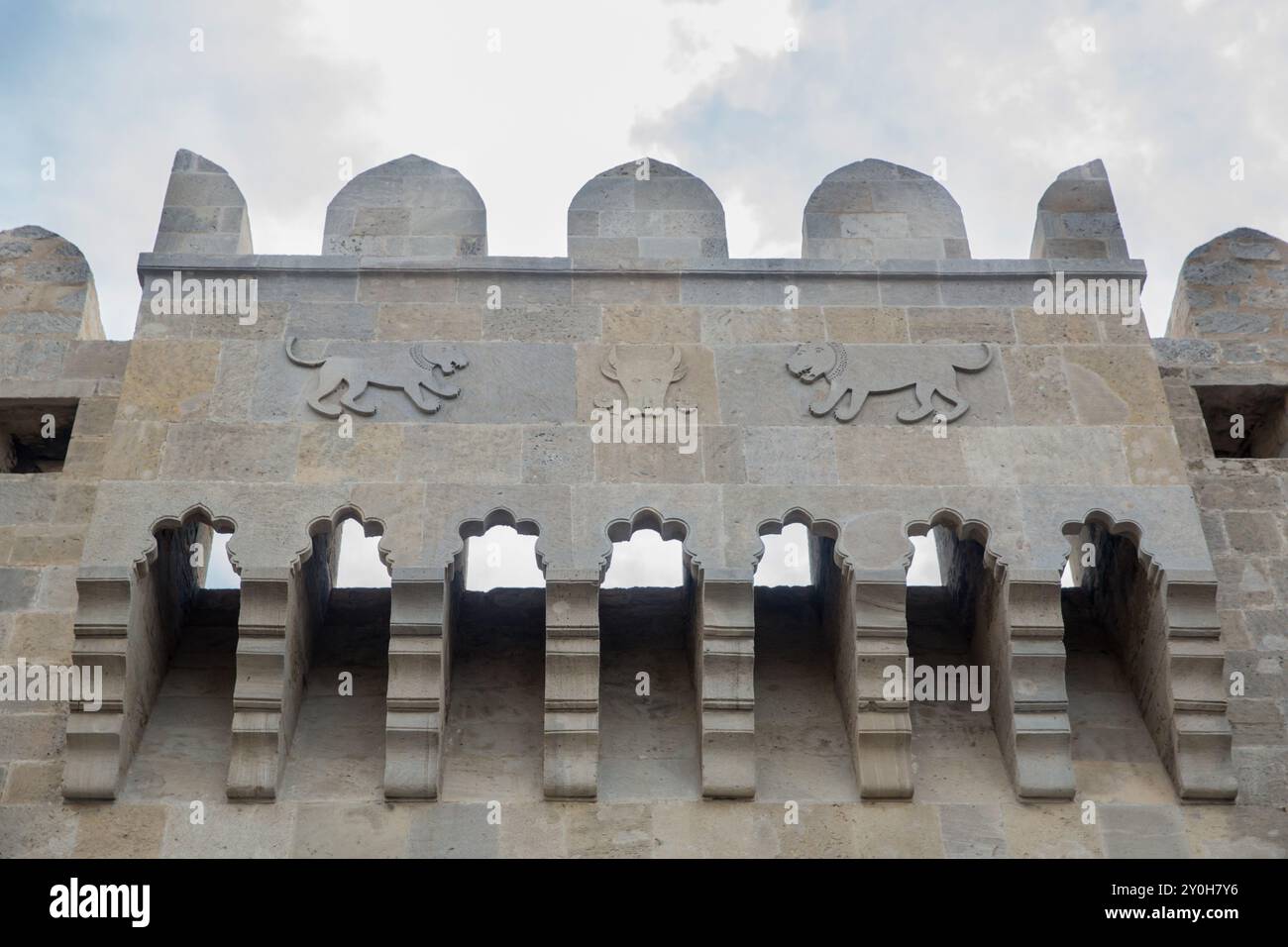 The bas-relief on the tower of ancient fortifications is a medieval ...