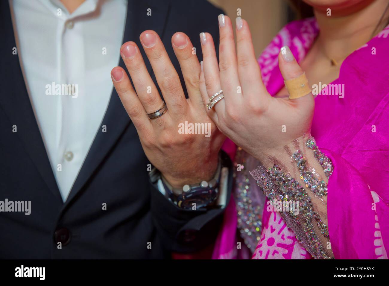 The engaged show off their rings . Groom and bride on the wedding day ...