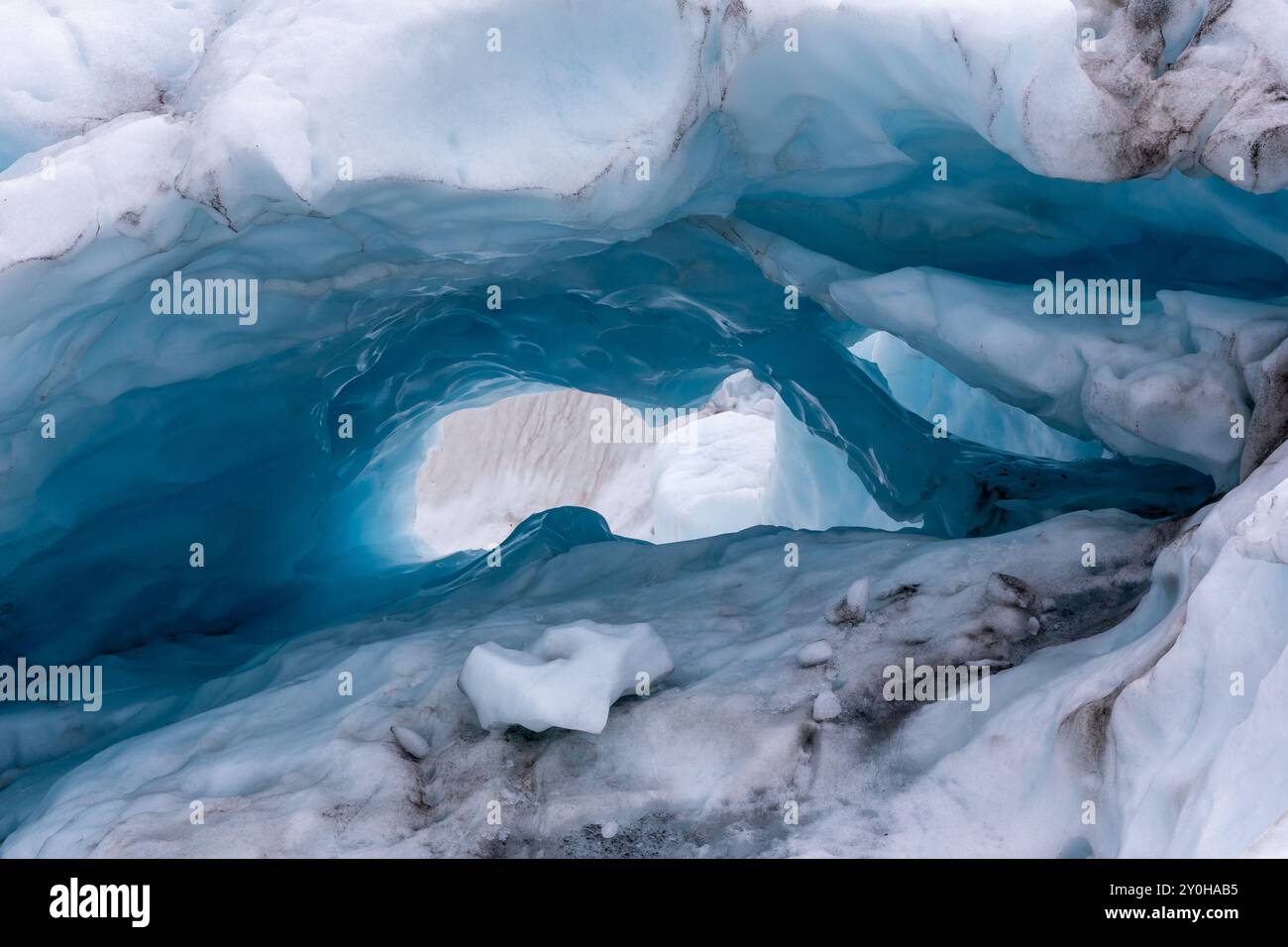 Blue ice cave in Skaftafell Glacier, part of Vatnajokull National Park ...