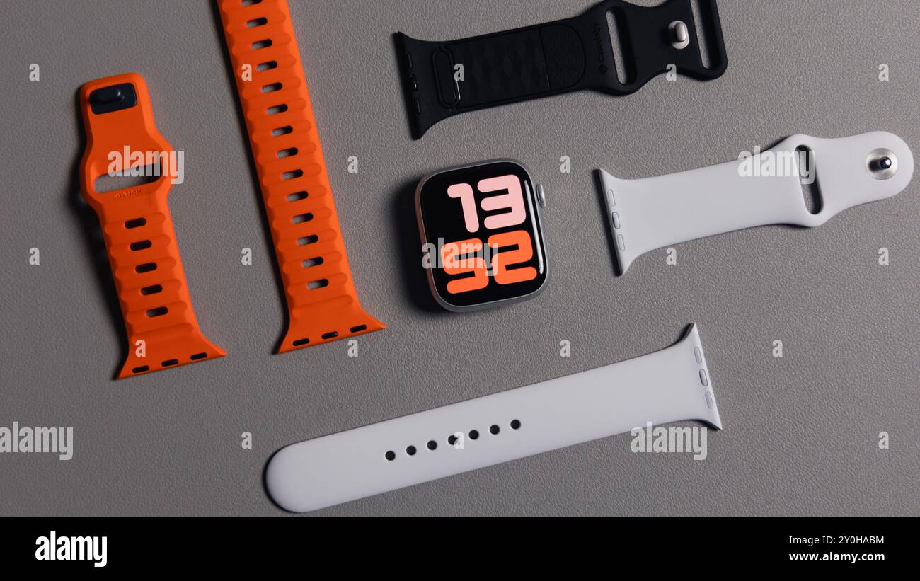 LONDON - AUGUST 26, 2024: Apple Watch with white band strap and time ...