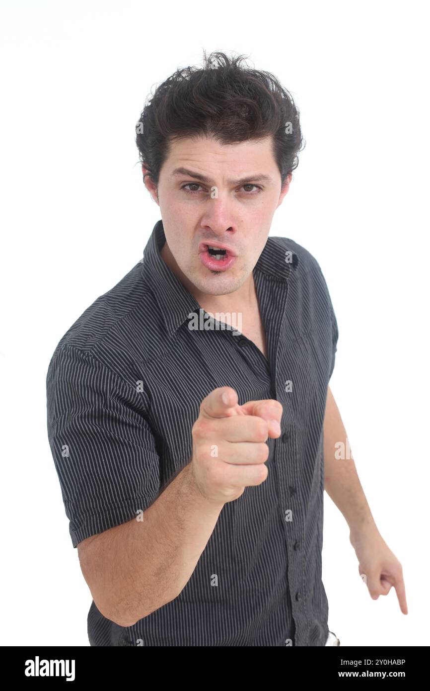 bossy angry man looking at camera pointing with his hand to the side ...