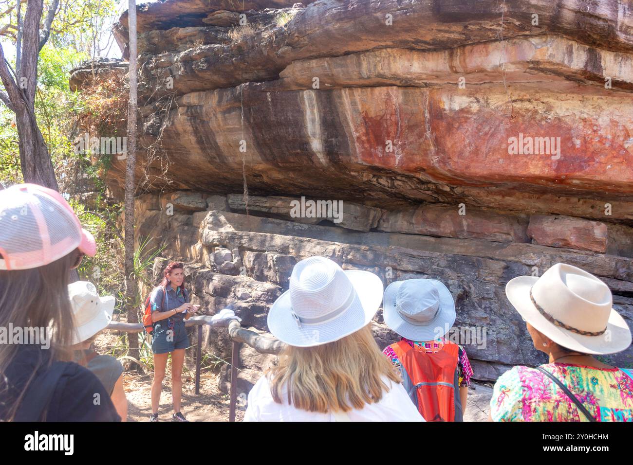 Group observing Ubirr Aboriginal rock art site, Kakadu National Park, Kakadu Highway, Jabiru ...