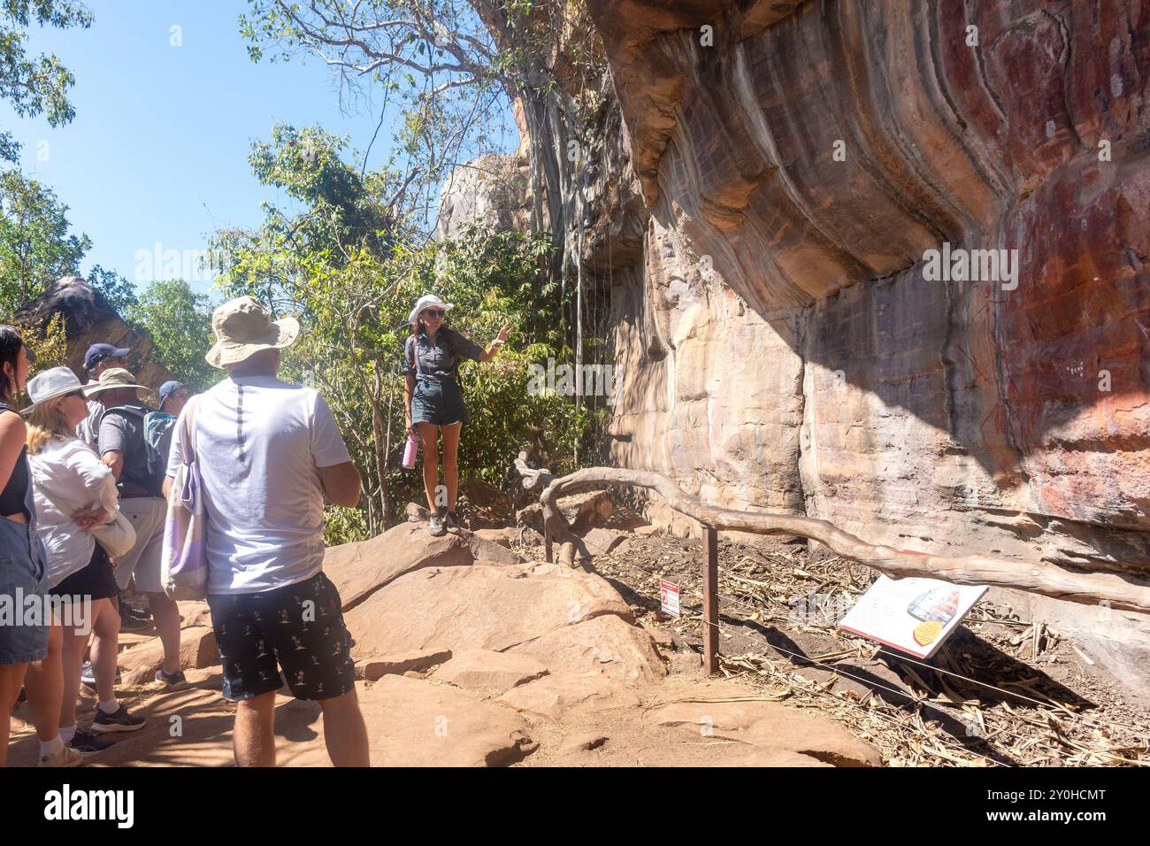 Guide with group at Ubirr Aboriginal rock art site, Kakadu National ...