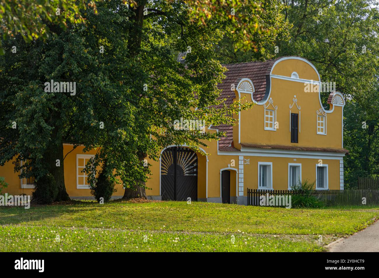 Old village square with color houses in summer day in Opatovice CZ 08 ...