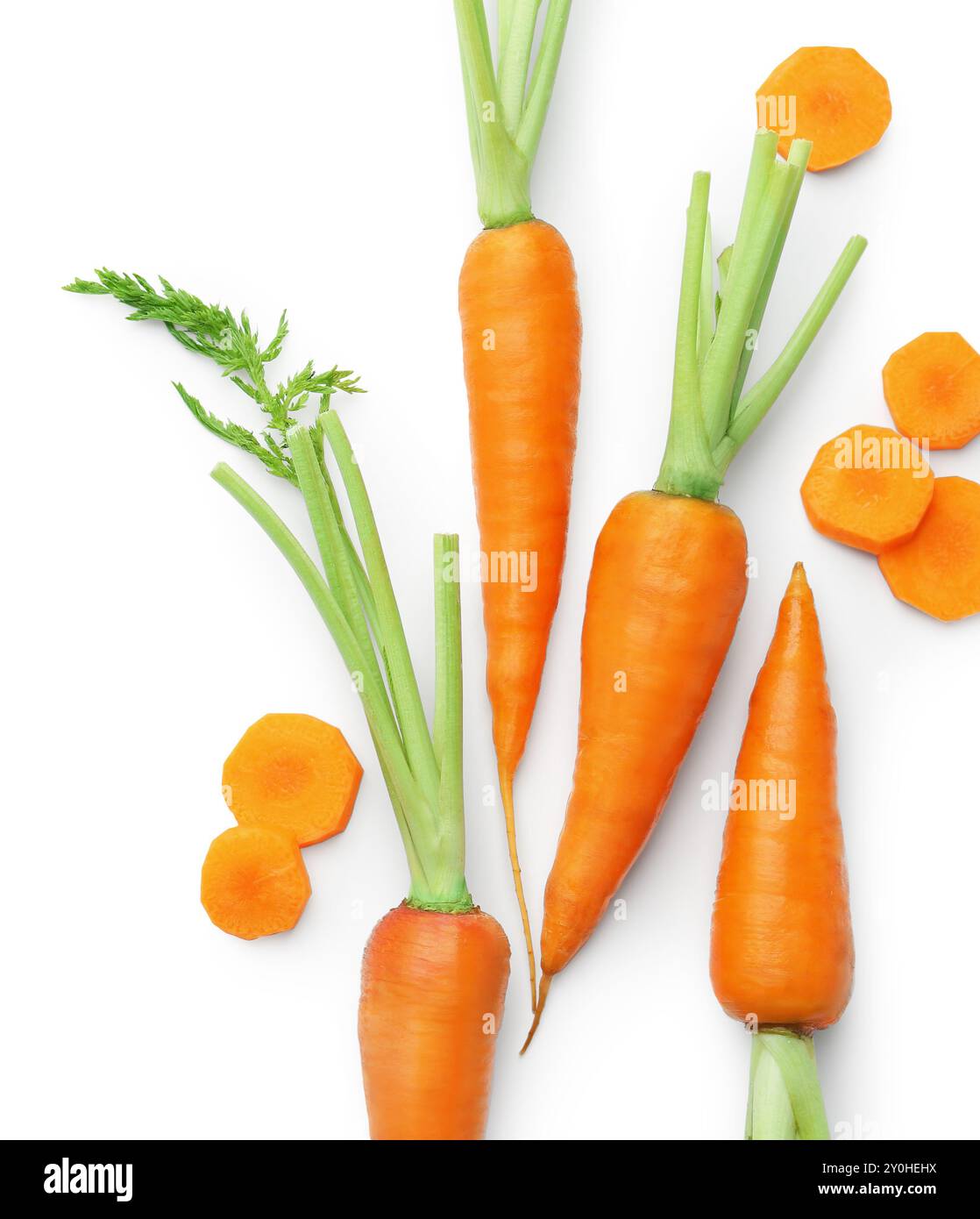 Whole and cut fresh carrots isolated on white, top view Stock Photo - Alamy