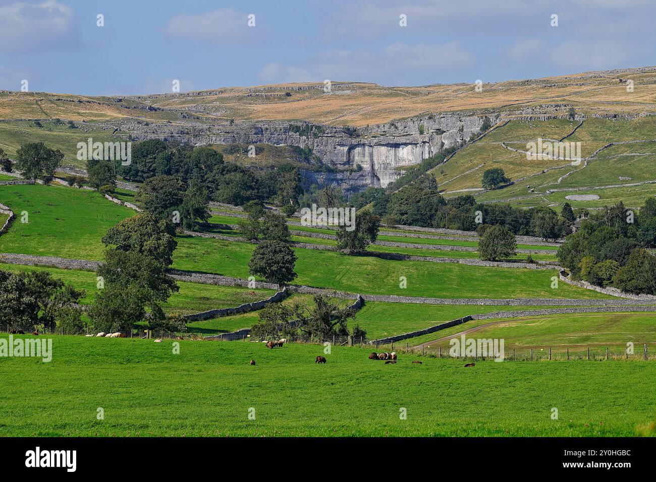 A view of Malham Cove as you enter the village of Malham in North ...