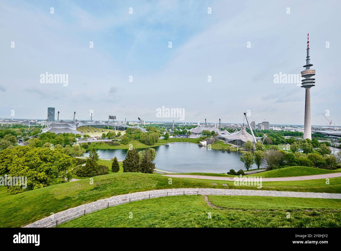 Munich, Germany - April 18, 2024: View of Olympia Park with Olympia Tower Olympiaturm in Munich ...