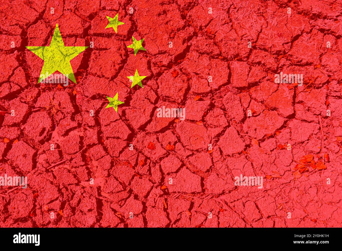 Cracked clay lake bed with Chinese flag painted on it (close-up ...