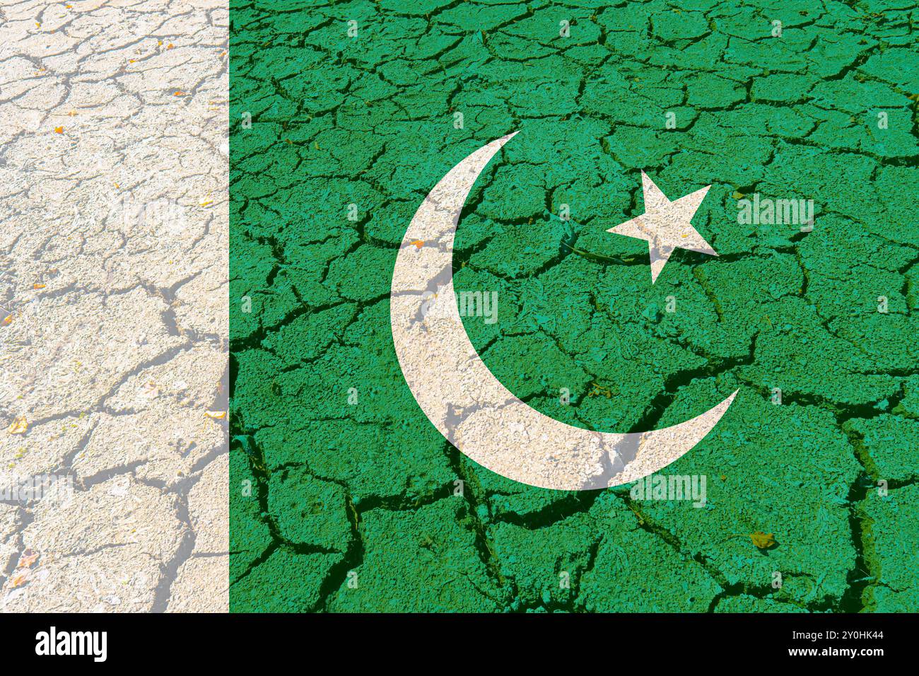 Cracked clay lake bed with Pakistan flag painted on it (close-up ...