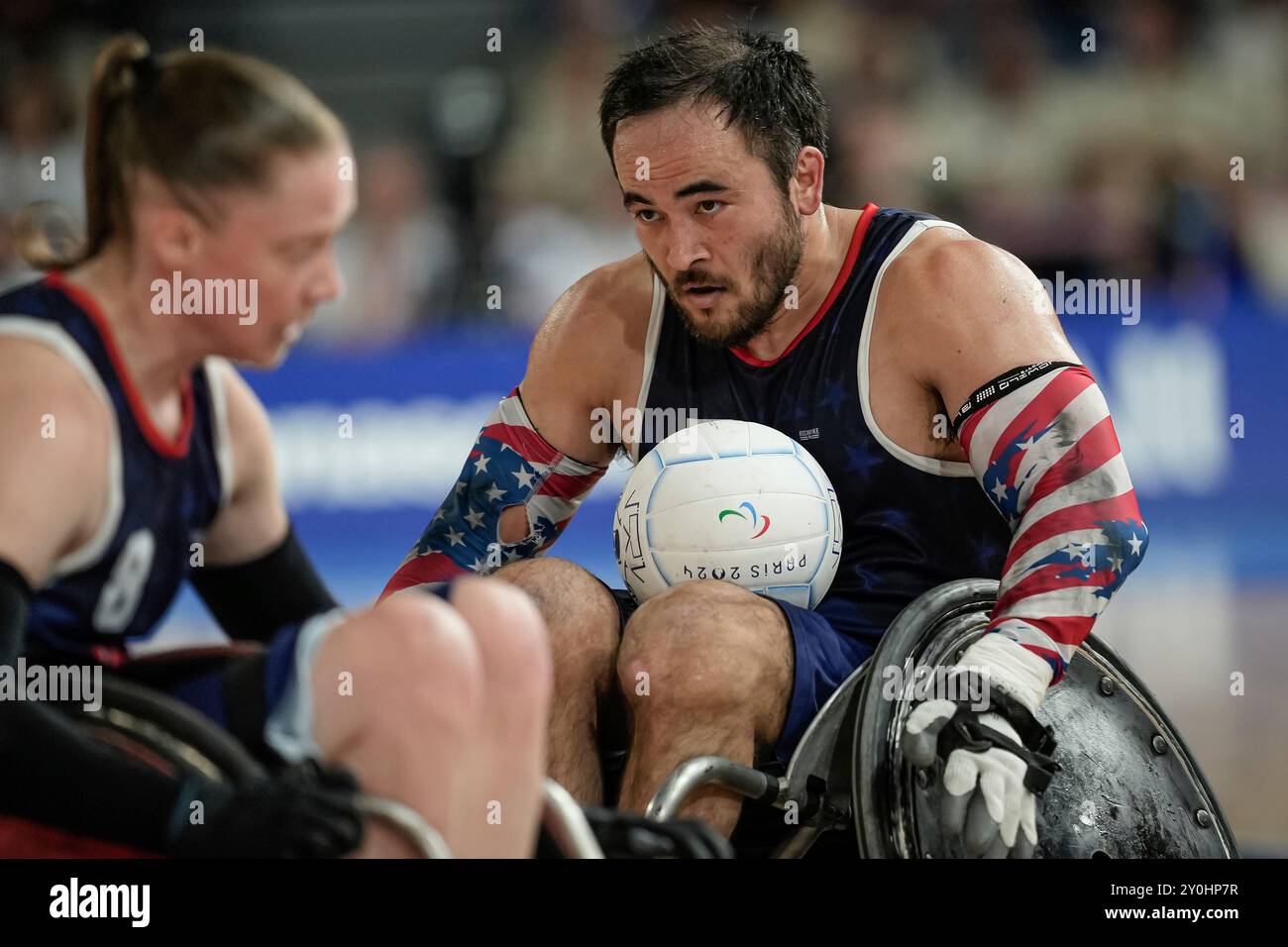 Chuck Aoki of the U.S. plays the ball during the wheelchair rugby gold ...