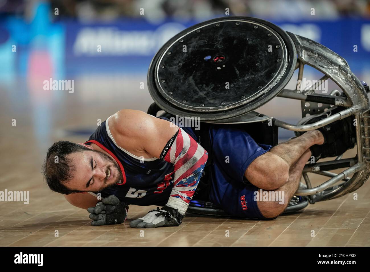 Chuck Aoki of the U.S. falls after colliding with a player during the ...