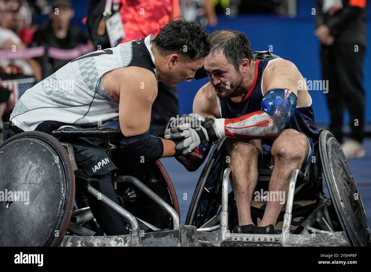 Japan's Yukinobu Ike, left, and Chuck Aoki of the U.S. hug after the ...