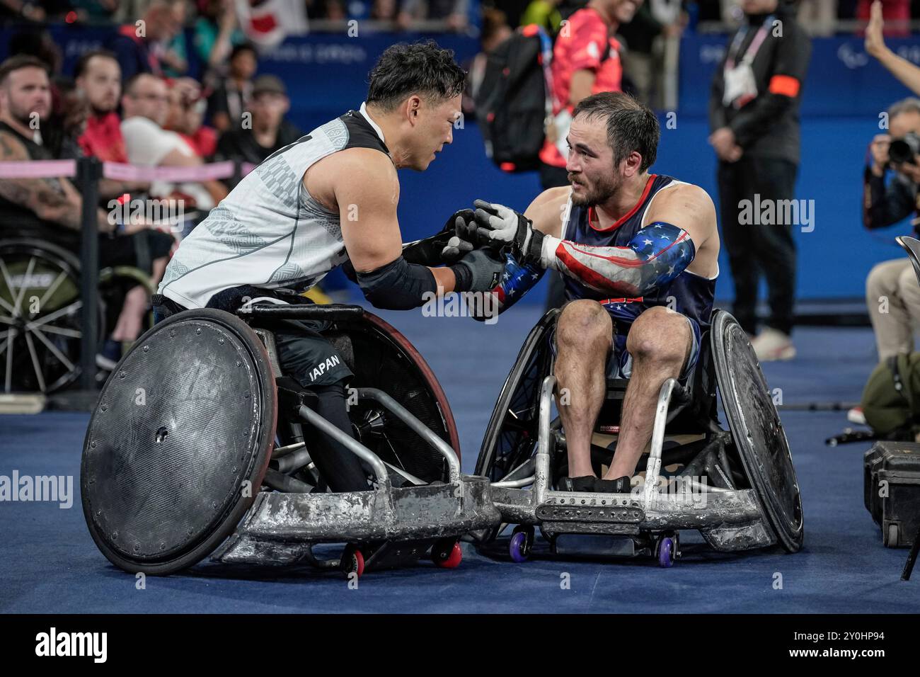 Japan's Yukinobu Ike, left, and Chuck Aoki of the U.S. greet each other ...