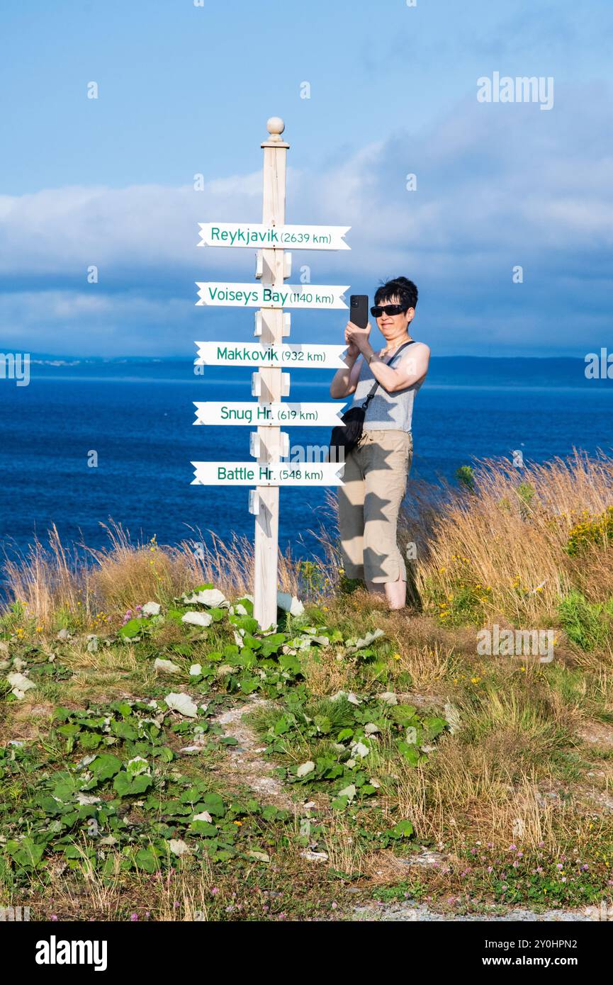 Directional signs to various cities from Green Point Lighthouse in Port ...