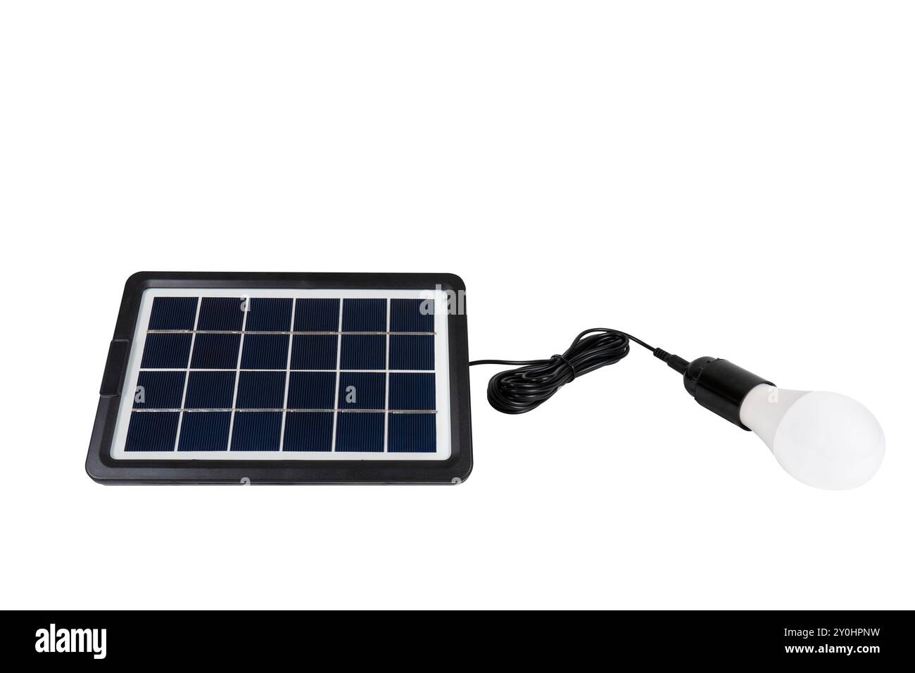 Portable solar panel connected to light bulb isolated on white ...