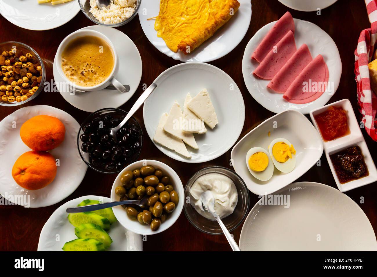 Turkish breakfast: egg, vegetables, cheeses, olives and ham. Halal ...