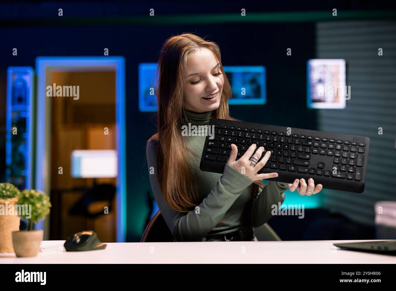 Content creator typing on mechanical keyboard while doing review in ...