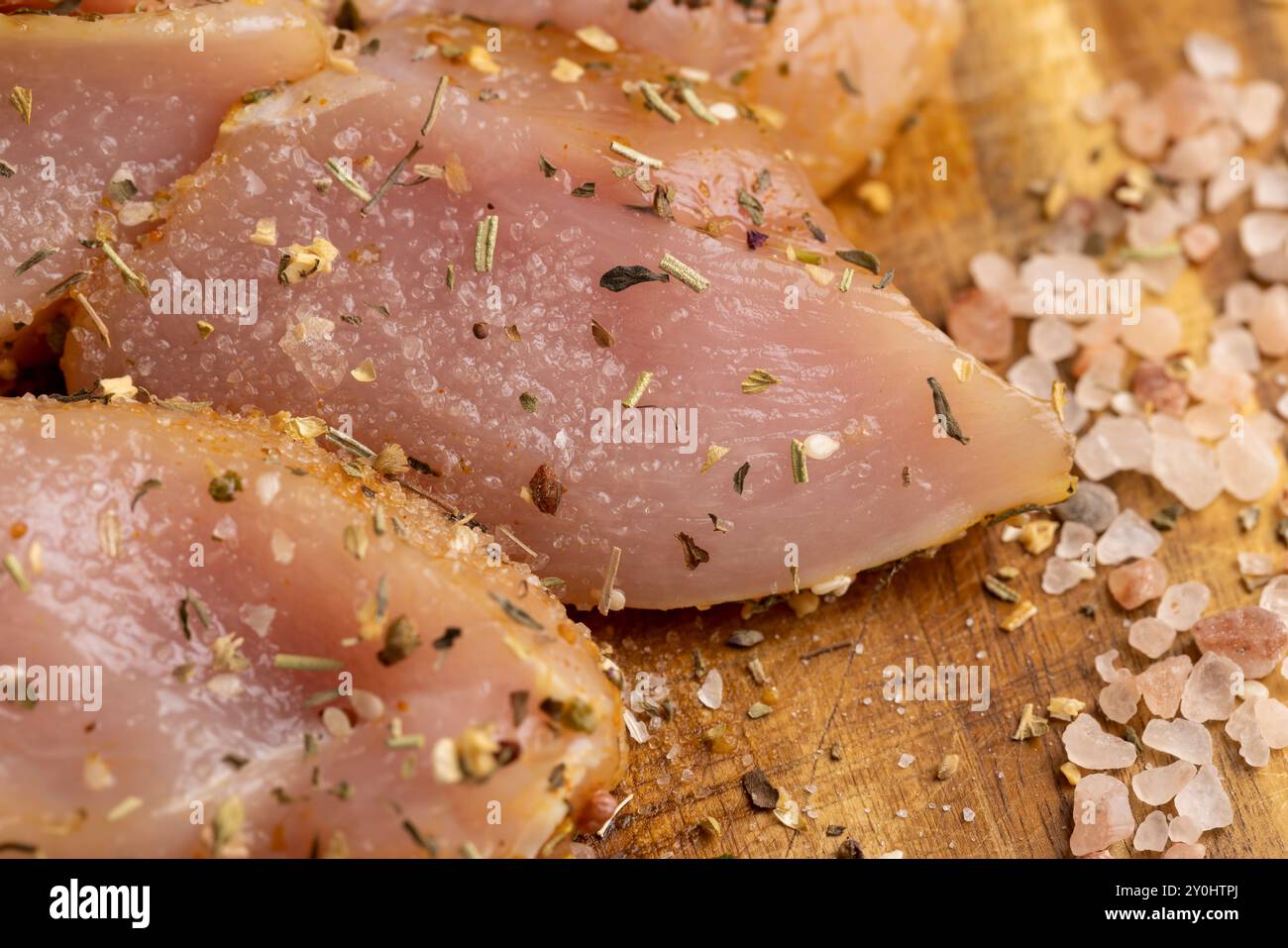 Freshly washed and skinned chicken meat, chicken fillets with salt and ...