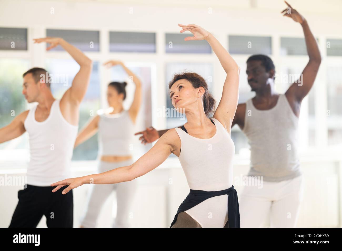Group of dancers rehearsing ballet dance Stock Photo - Alamy