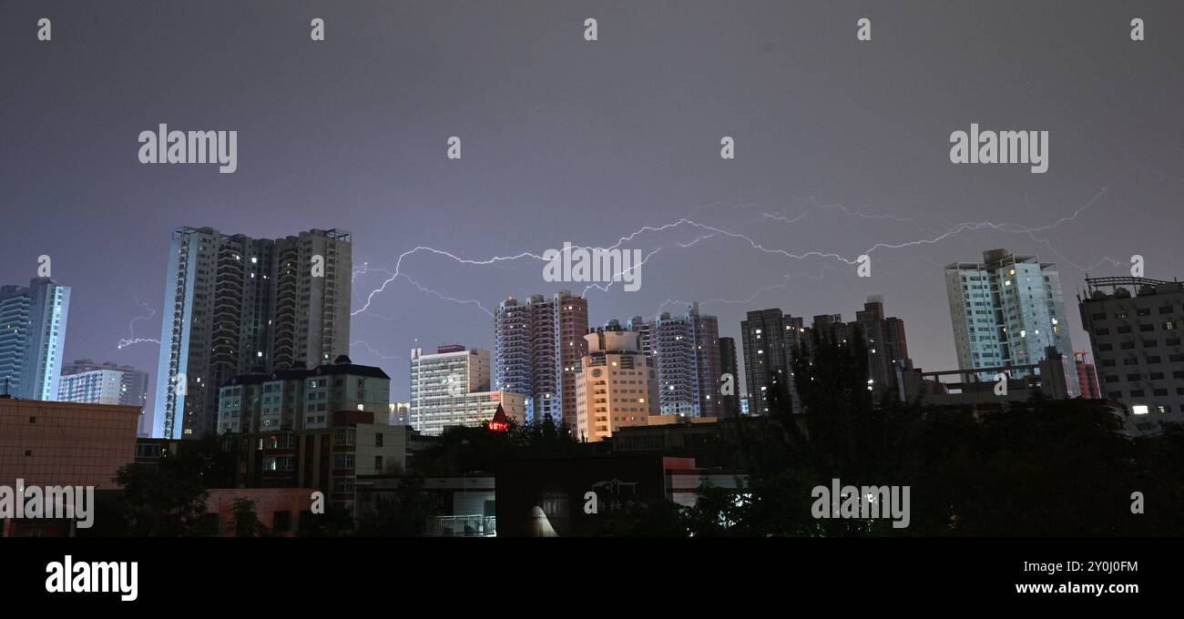 KORLA, CHINA - SEPTEMBER 3, 2024 - A lightning bolt strikes the sky ...