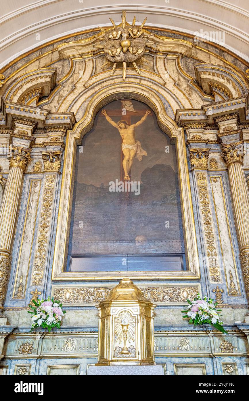 Altar and painting of Jesus Christ crucified inside a Catholic church ...