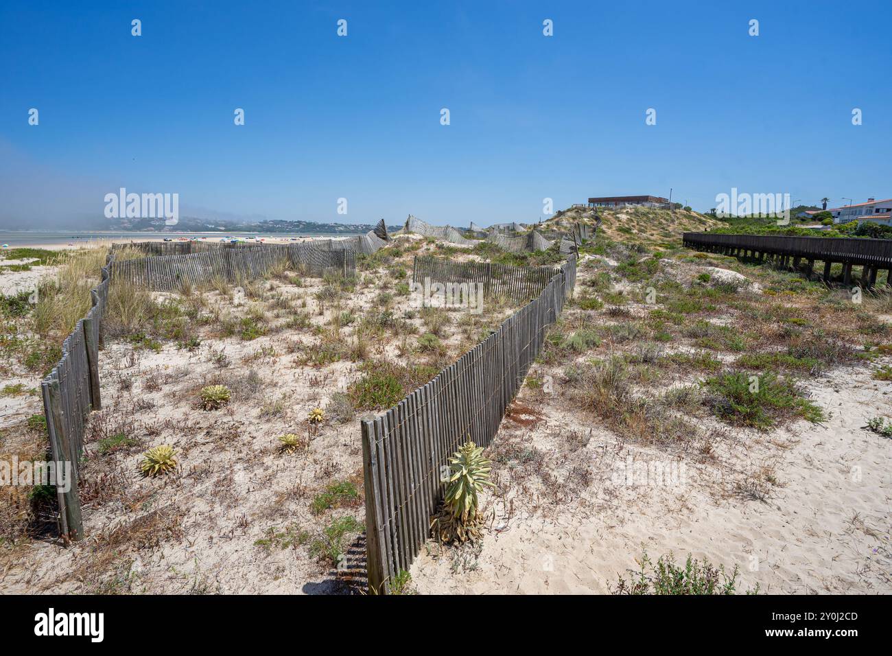 Dune protection fence on Obidos Lagoon beach Stock Photo - Alamy