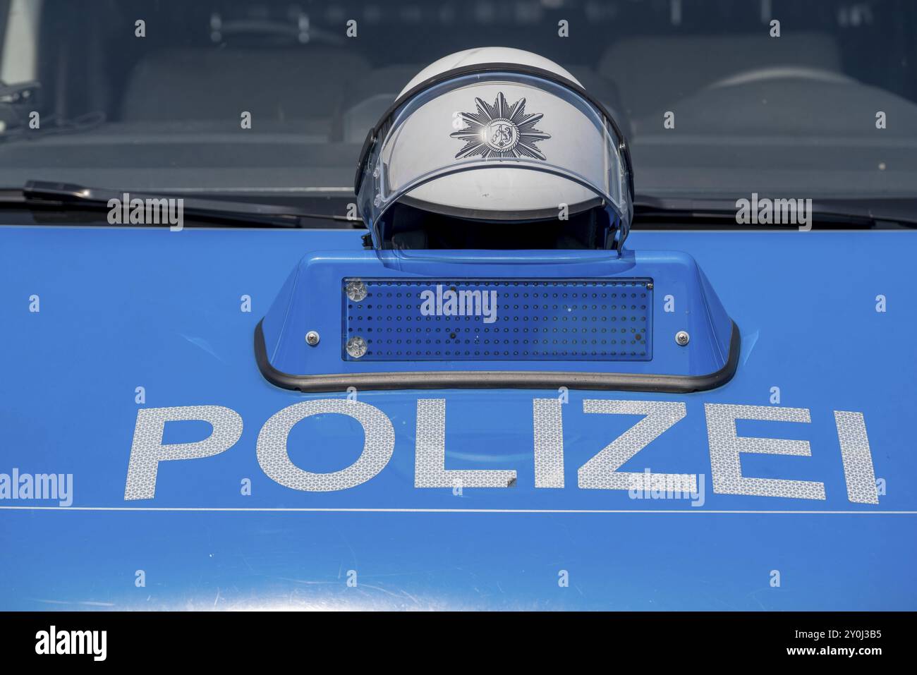Police, patrol car, helmet lying on the bonnet, during a break ...