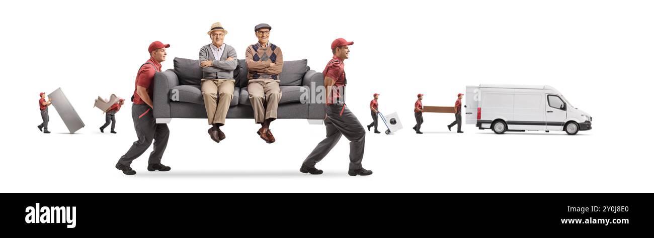 Movers carrying two elderly men seated on a sofa and loading a van ...