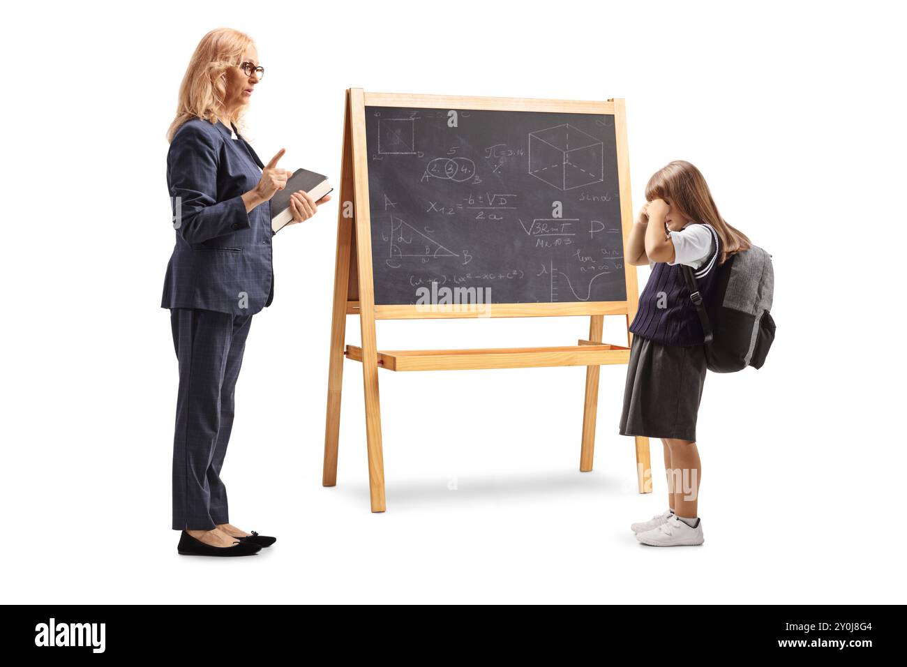 Full length profile shot of a teacher talking to a sad schoolgirl in ...