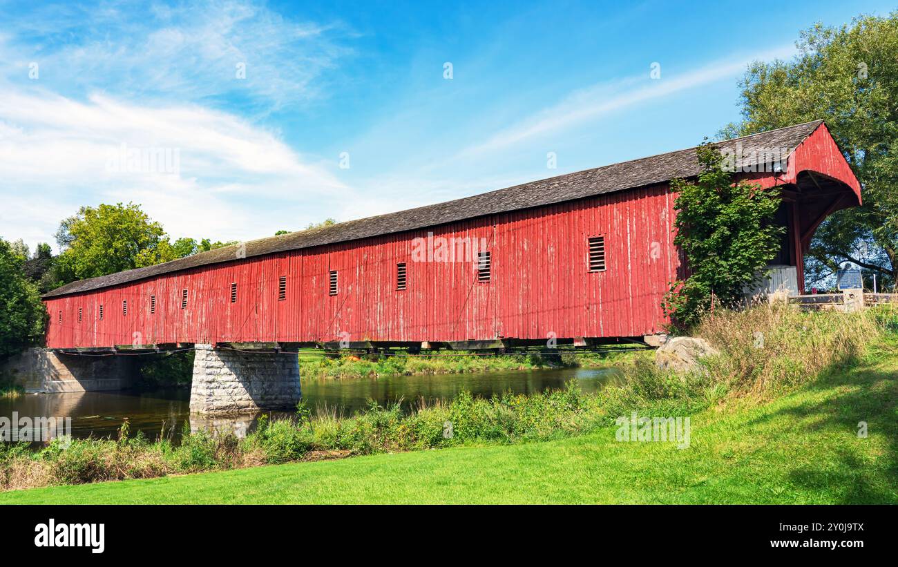 The West Montrose Covered Bridge also known as the kissing Bridge spans ...